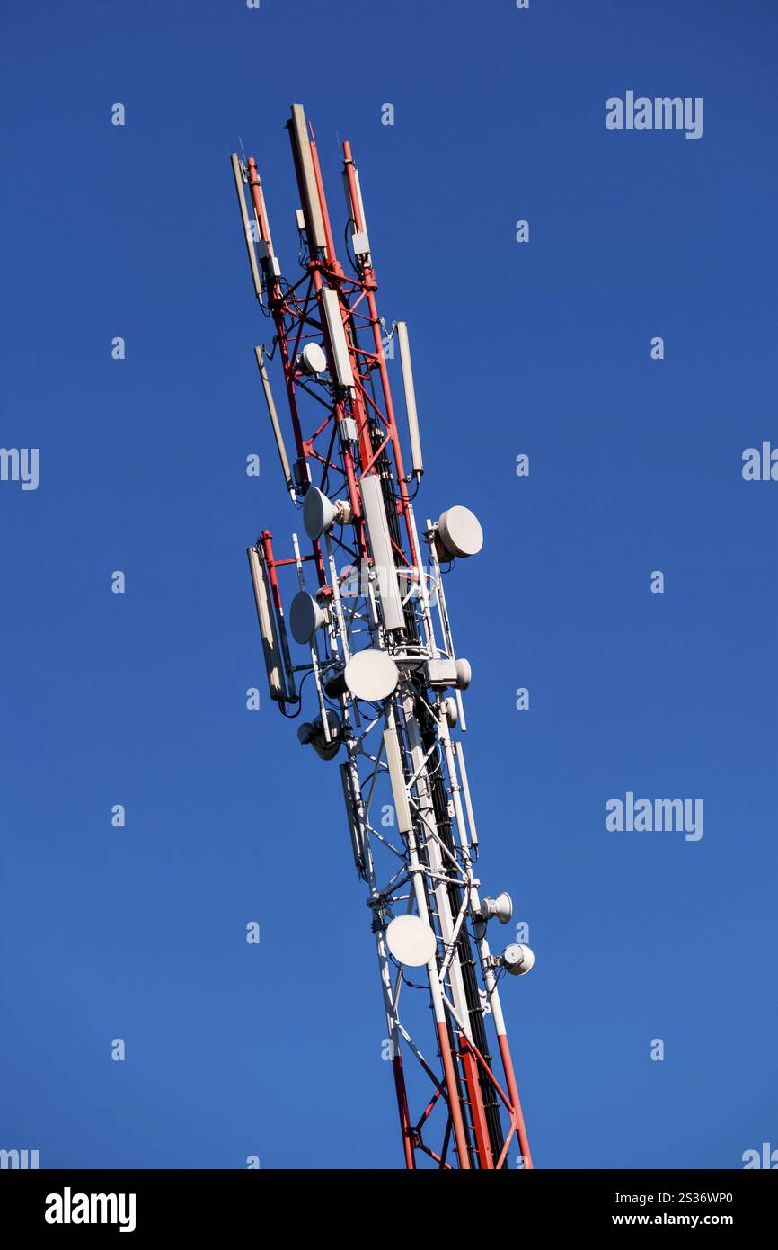 Mobile phone mast and blue sky, symbol for communication, mobility ...