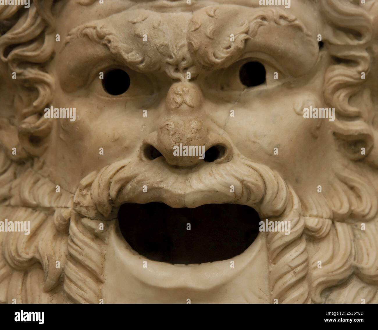Antique satyr mask Stock Photo - Alamy
