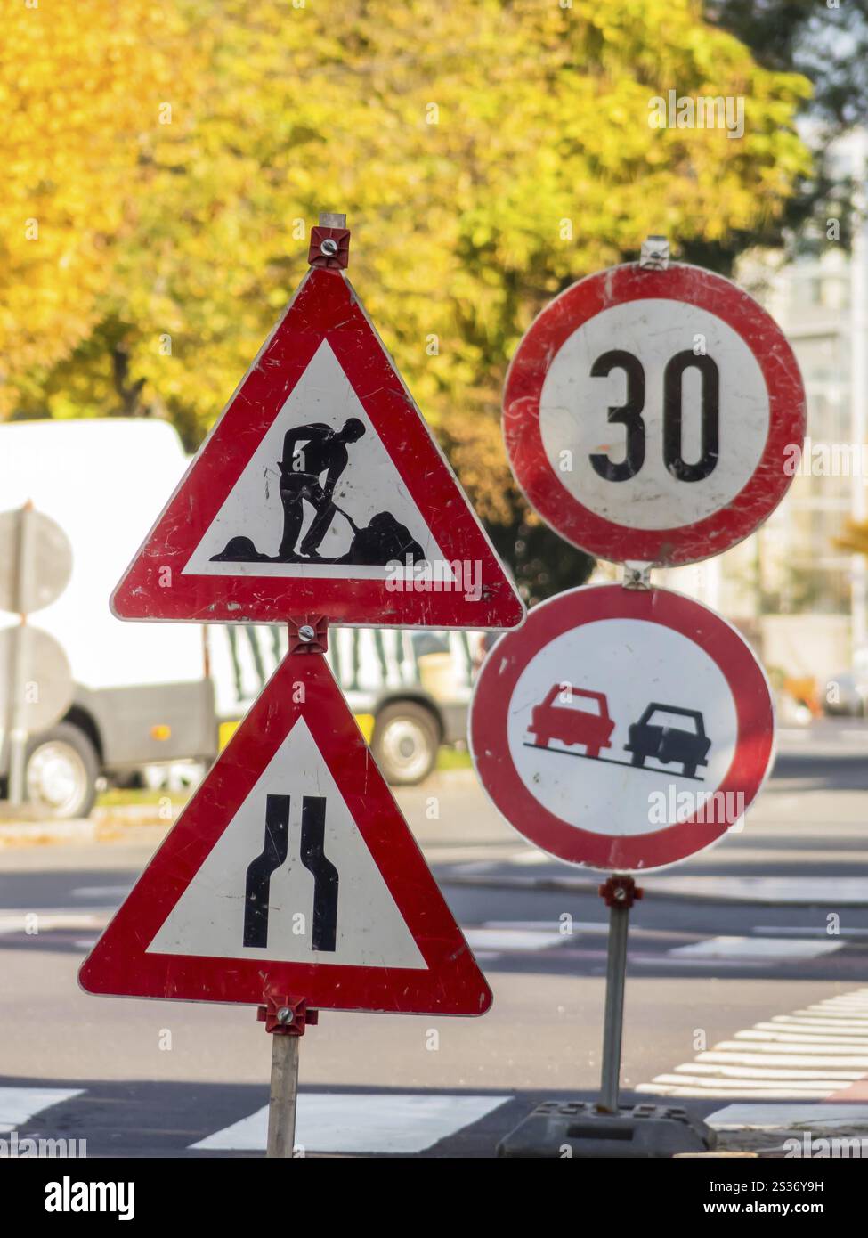 A roadworks site is secured by several traffic signs. Austria Stock ...