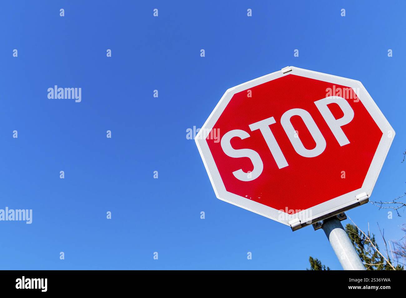 A stop sign on a road Symbol photo for stop and end Austria Stock Photo ...