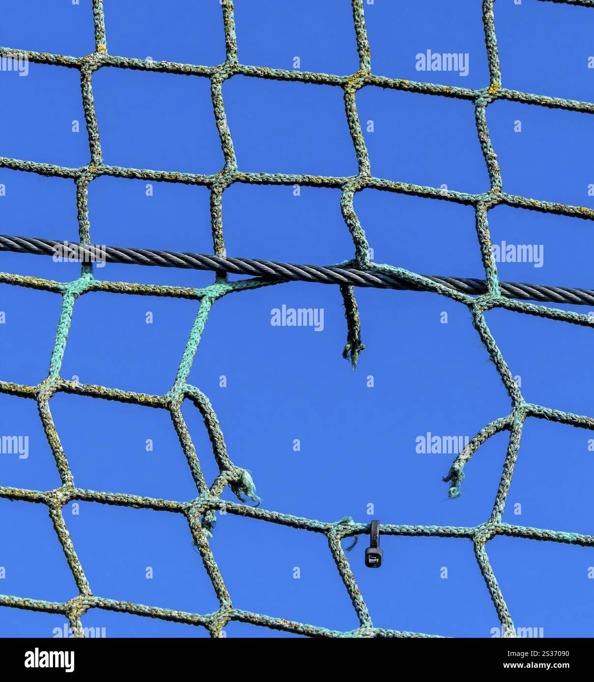 Hole in a net, symbolising imprisonment, obstacle, hope, damage Austria ...