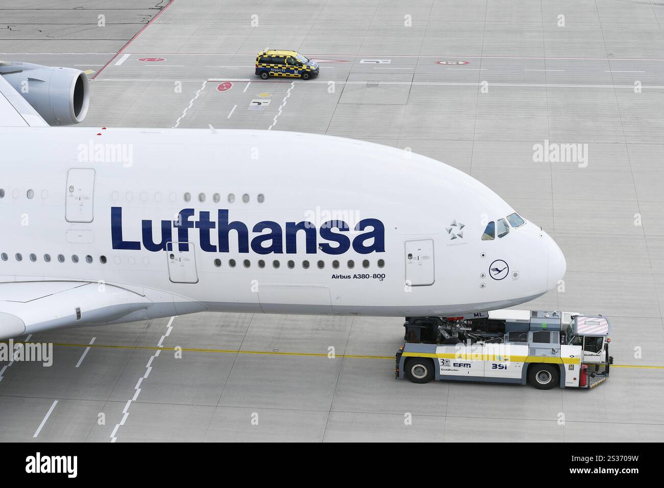 Lufthansa Airbus A380-800 being towed with push back truck on taxiway ...