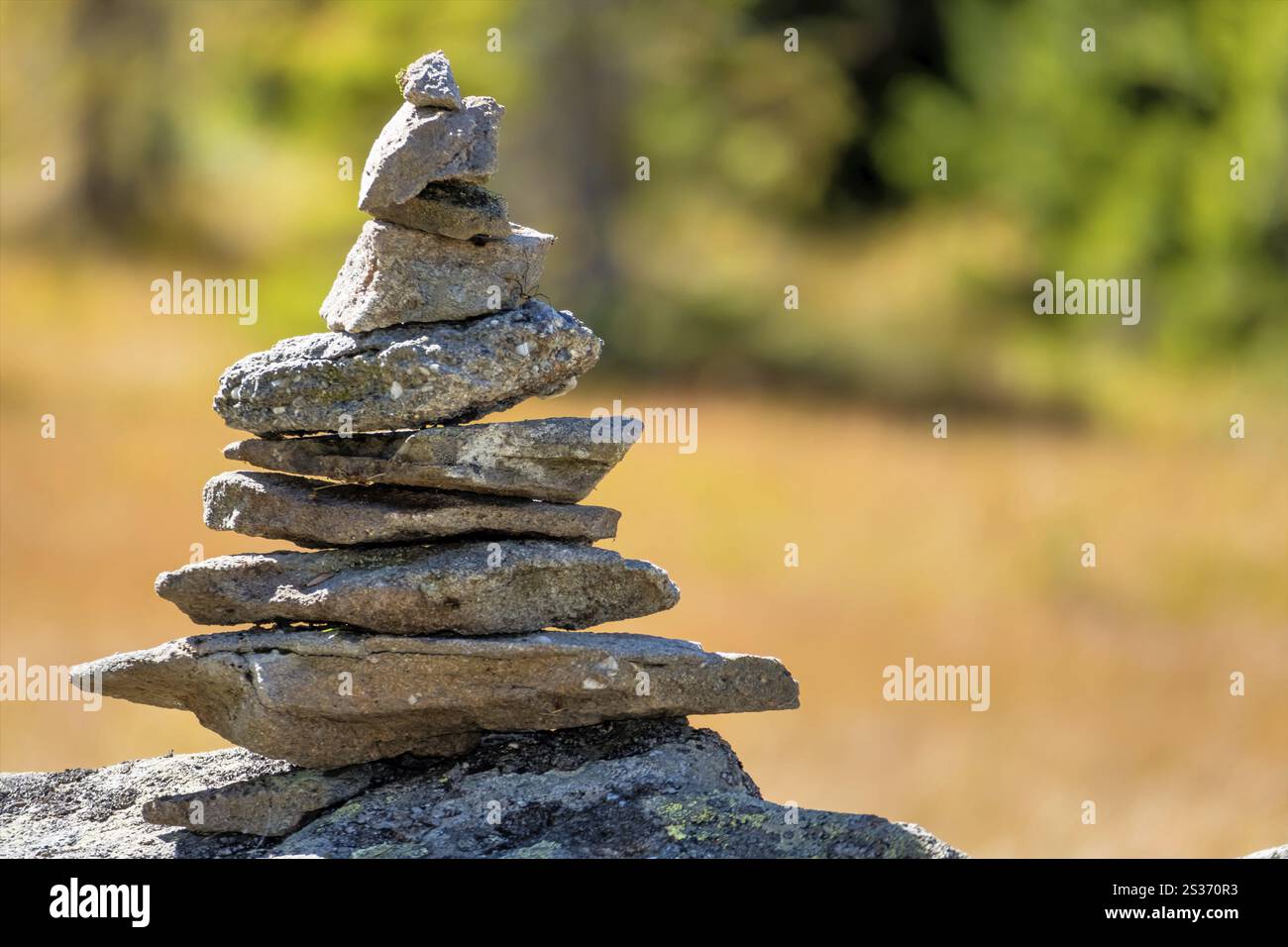 Stones stacked on top of each other, symbol for hiking, marking ...