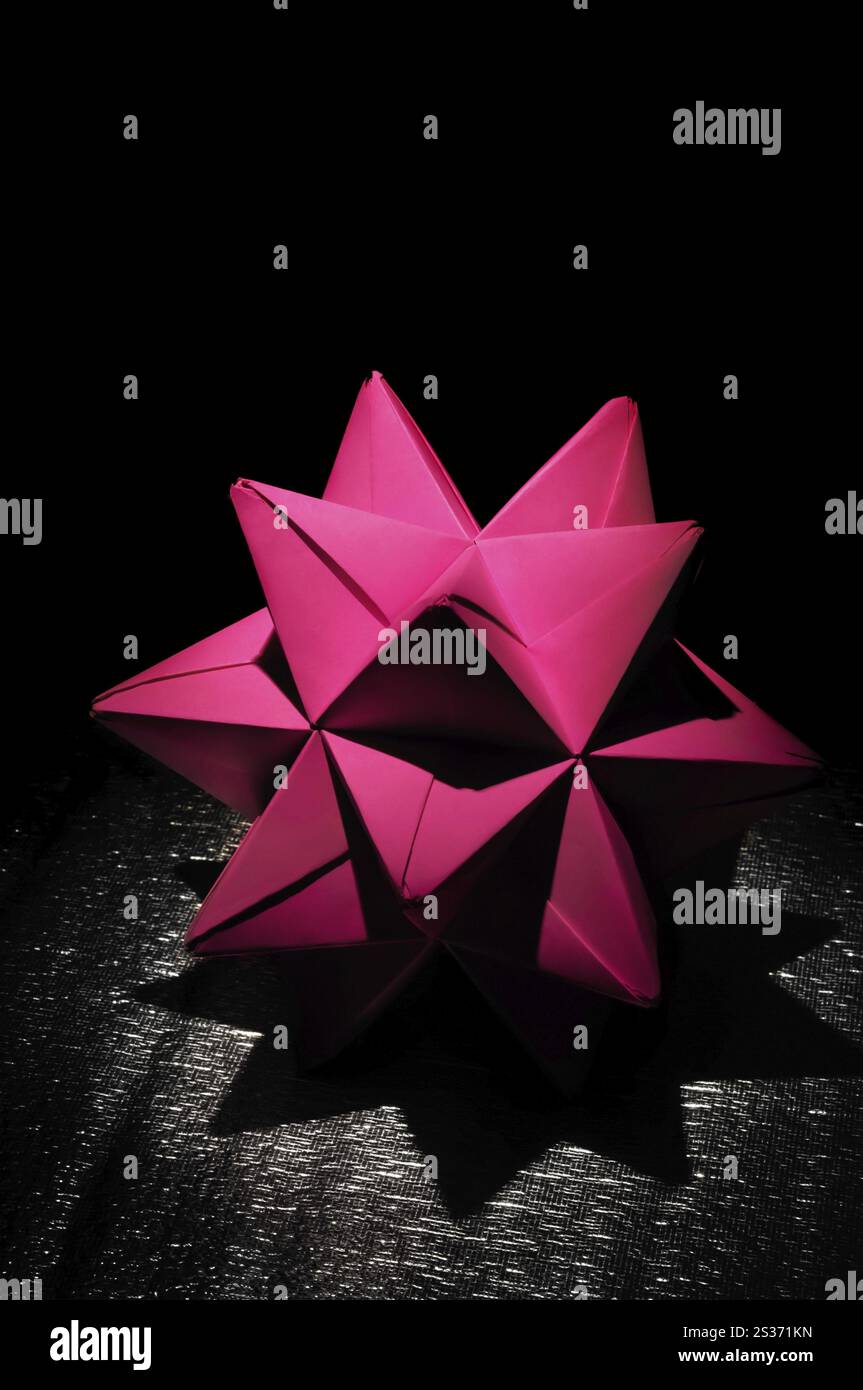 Abstract purple Origami polyhedron figure on silvery background Stock ...
