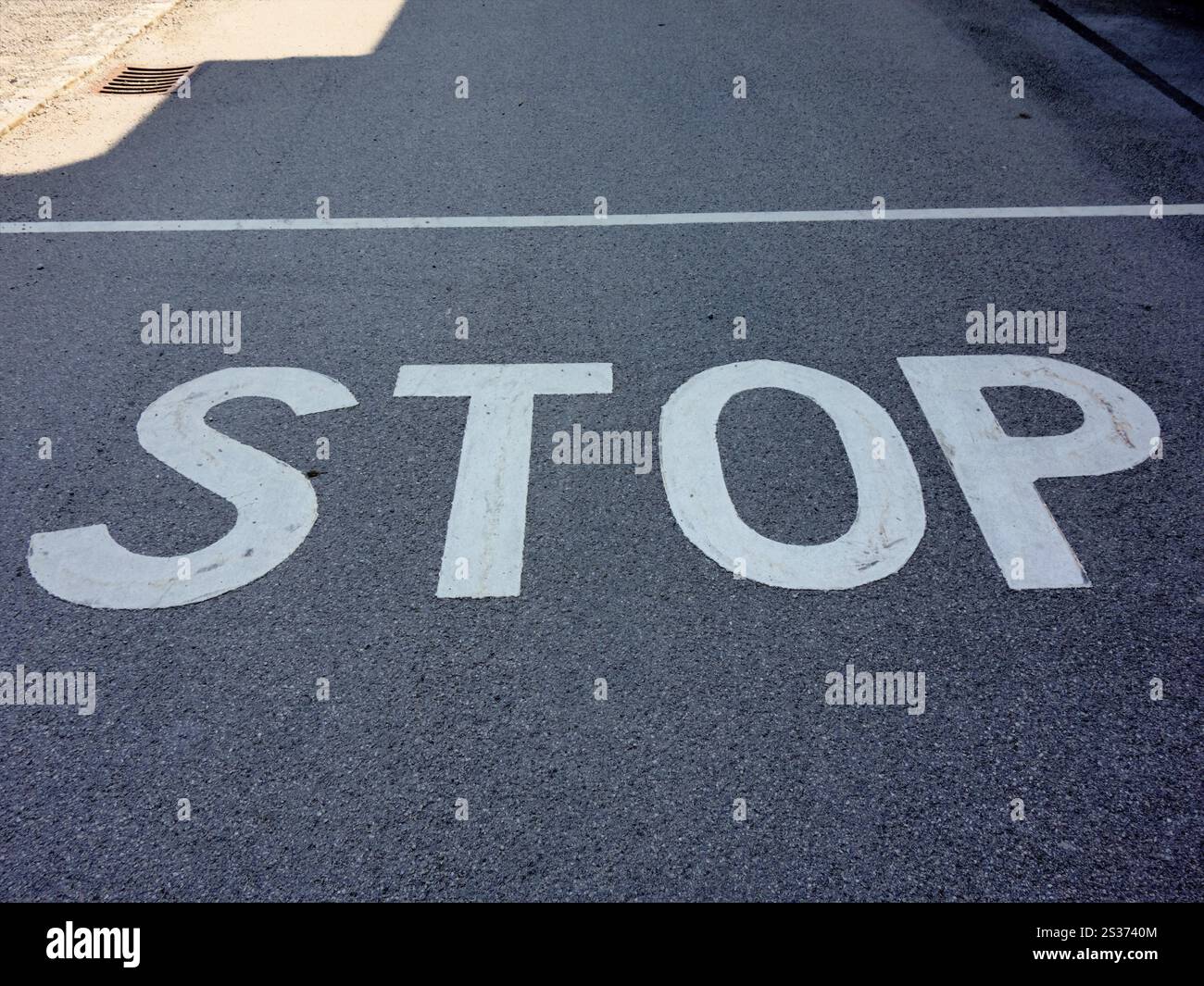 The sign Stop on a road Stop in front of a junction because of stop ...