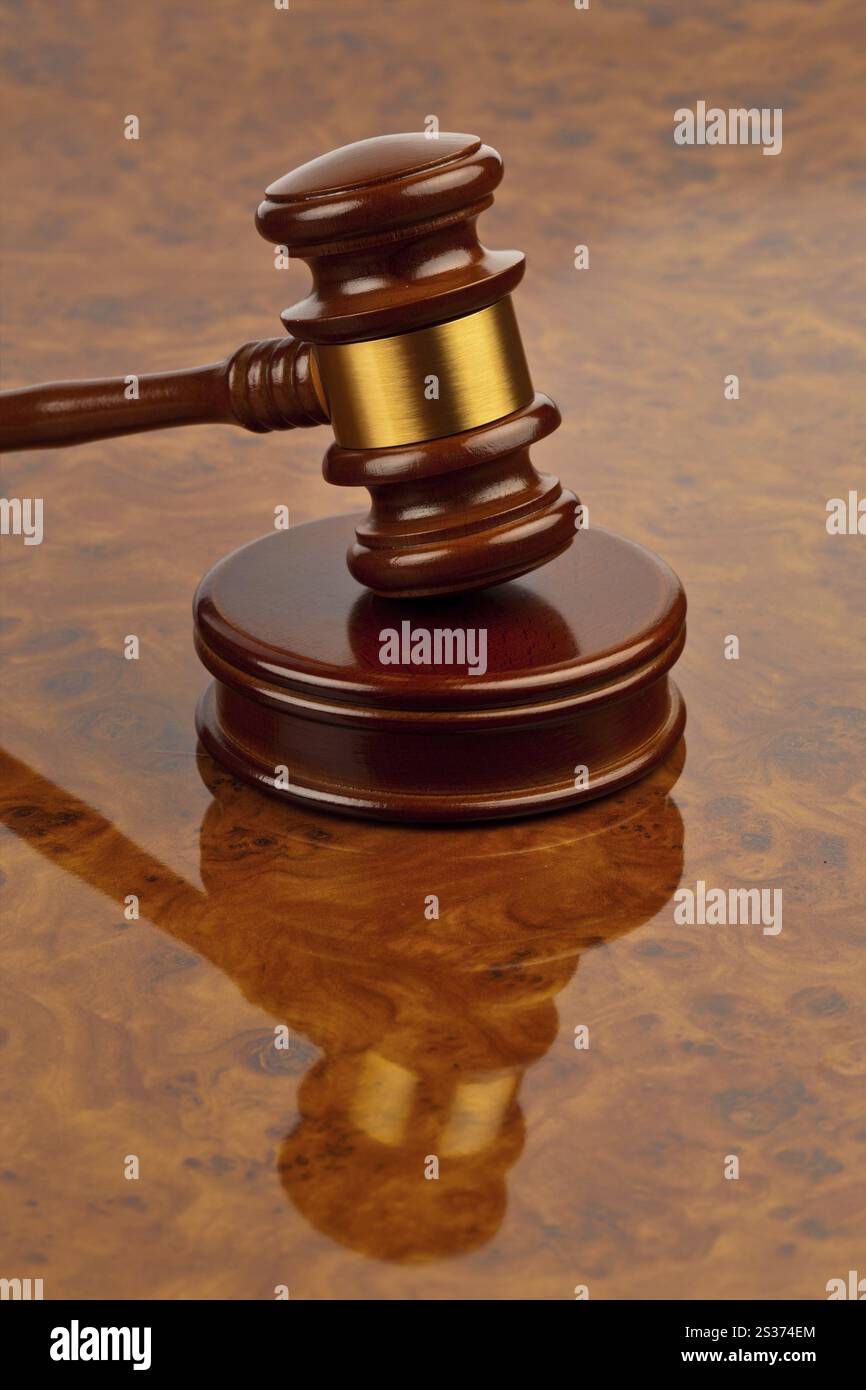 The gavel of a judge in court. Lying on a desk. Austria Stock Photo - Alamy