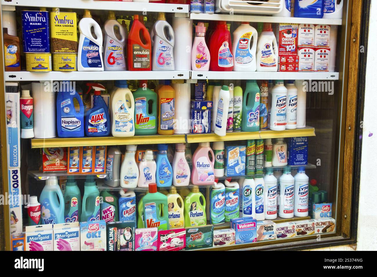 Many cleaning products stand side by side in a drugstore display in ...