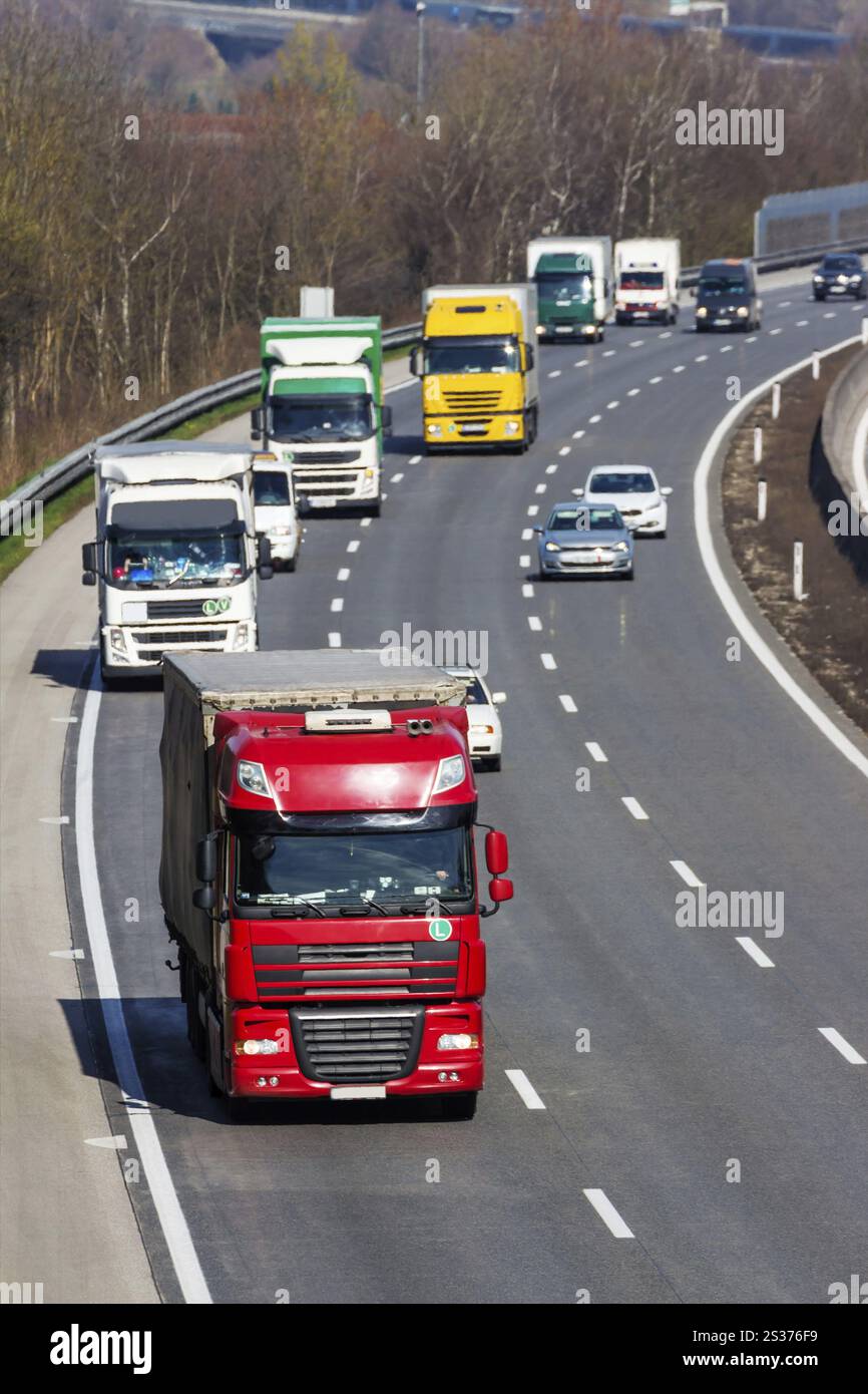 Trucks on the motorway. Road transport for goods. Austria Stock Photo ...
