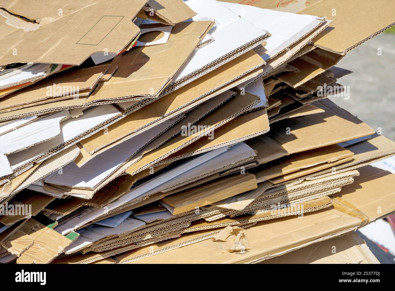 Cardboard boxes waiting to be collected by the waste collection service ...
