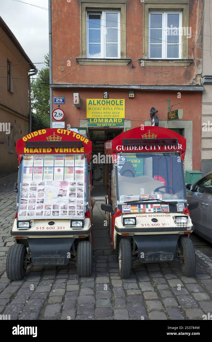 Small sightseeing buses in Krakow Stock Photo - Alamy