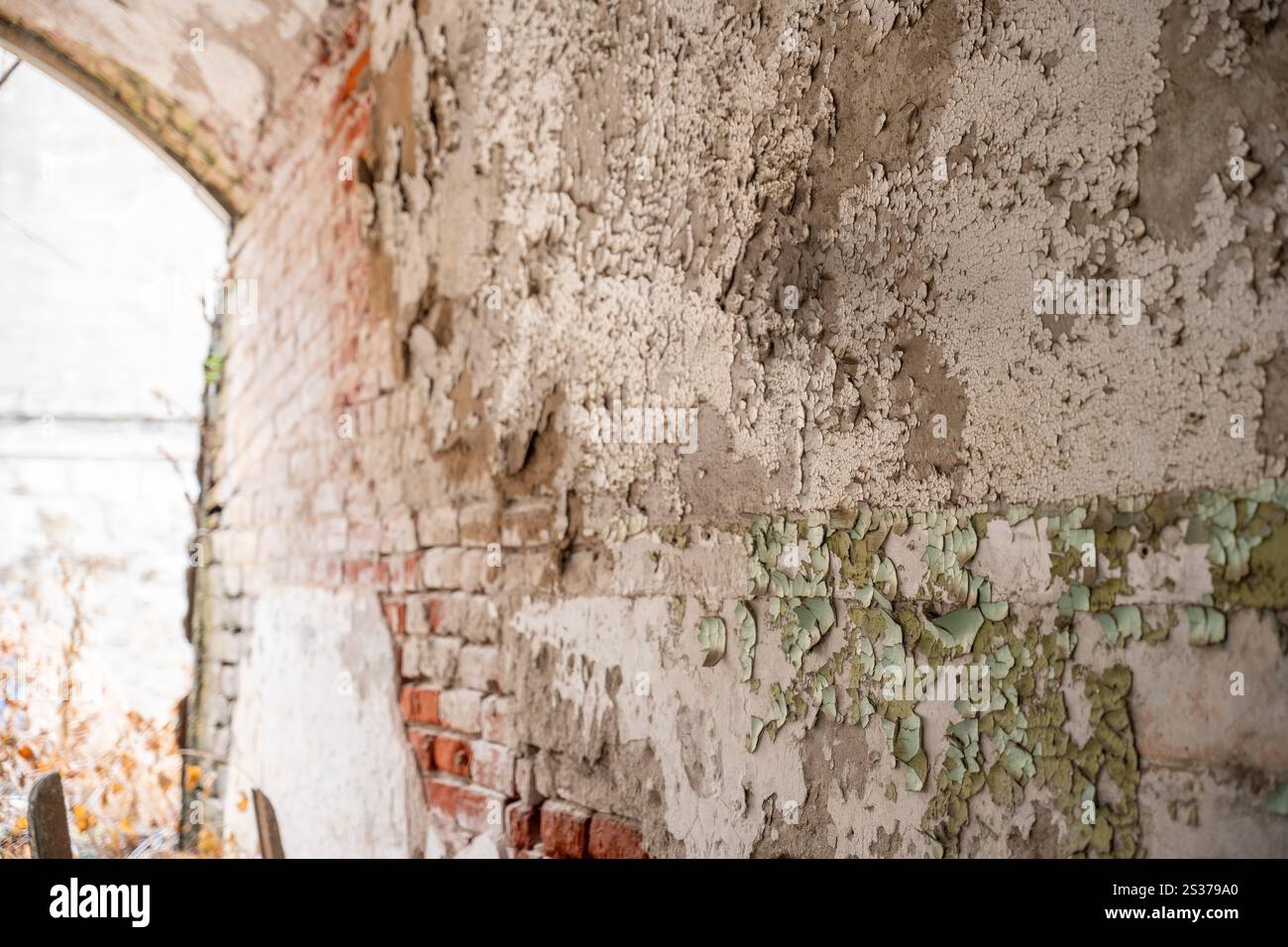 Chipped and flaking layers of lead based paint on the exterior of an ...