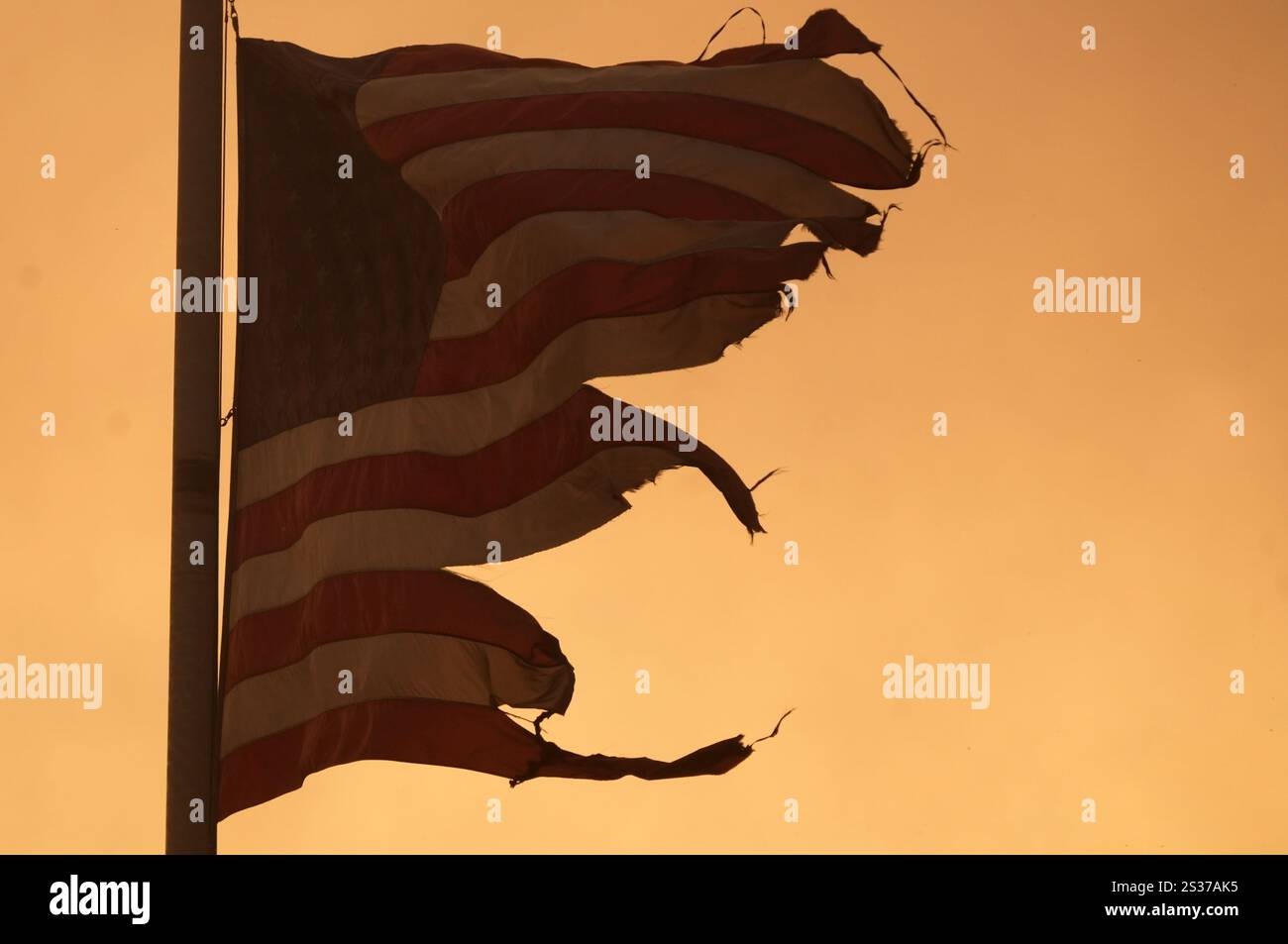 Altadena, United States. 08th Jan, 2025. A tattered flag on E. Altadena ...