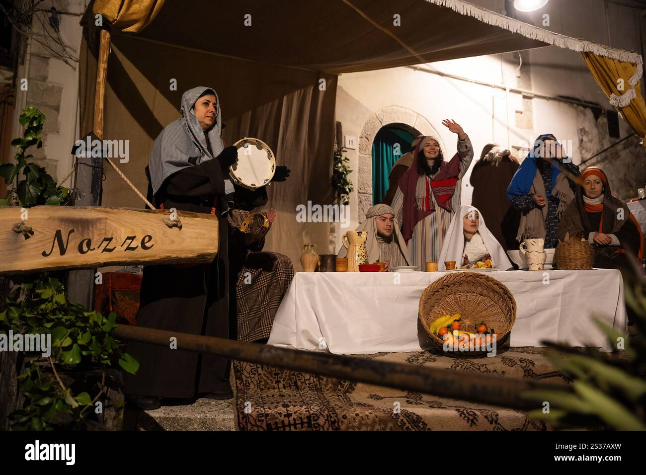 Representation of a wedding feast in the streets of Bethlehem seen ...