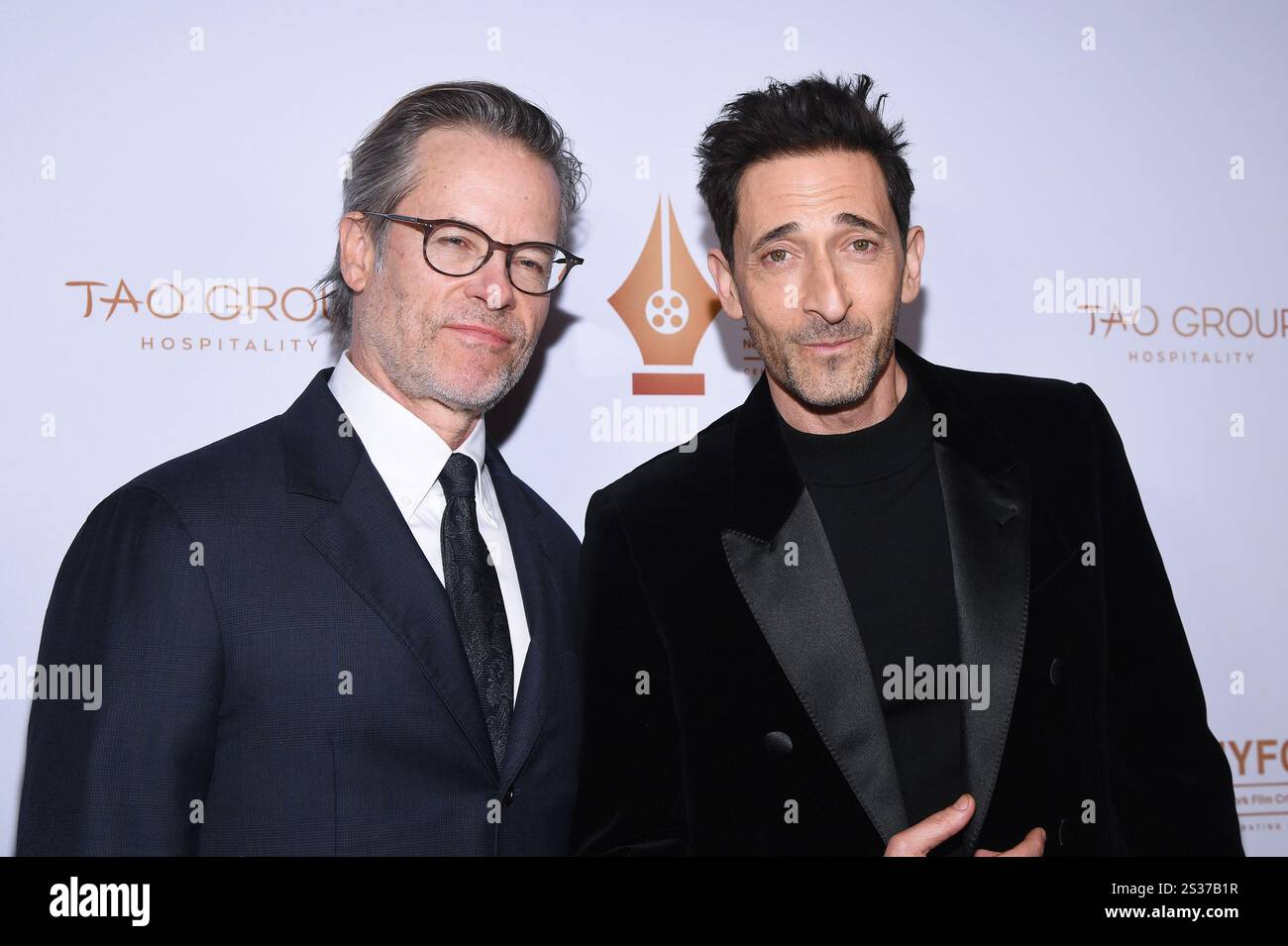 New York, USA. 08th Jan, 2025. (L-R) Guy Pearce and Adrien Brody attend ...