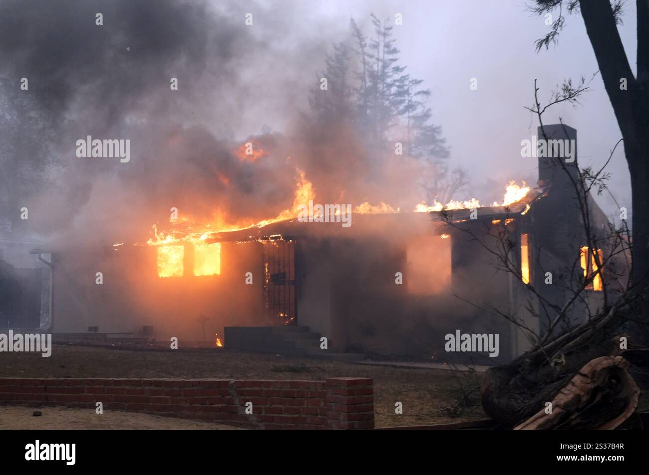 Altadena, United States. 08th Jan, 2025. A residence burns during the ...