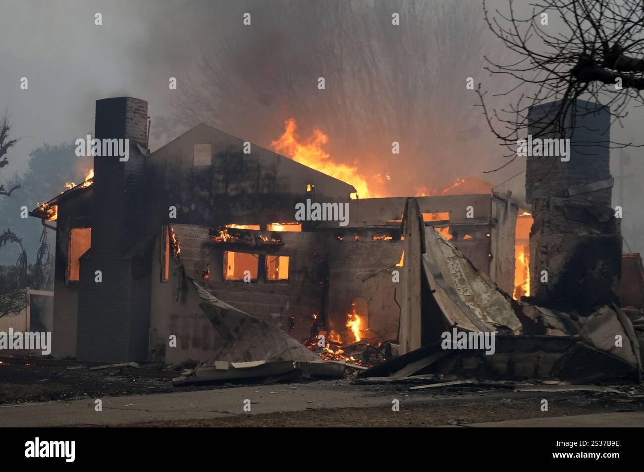 Altadena, United States. 08th Jan, 2025. A residence burns during the ...