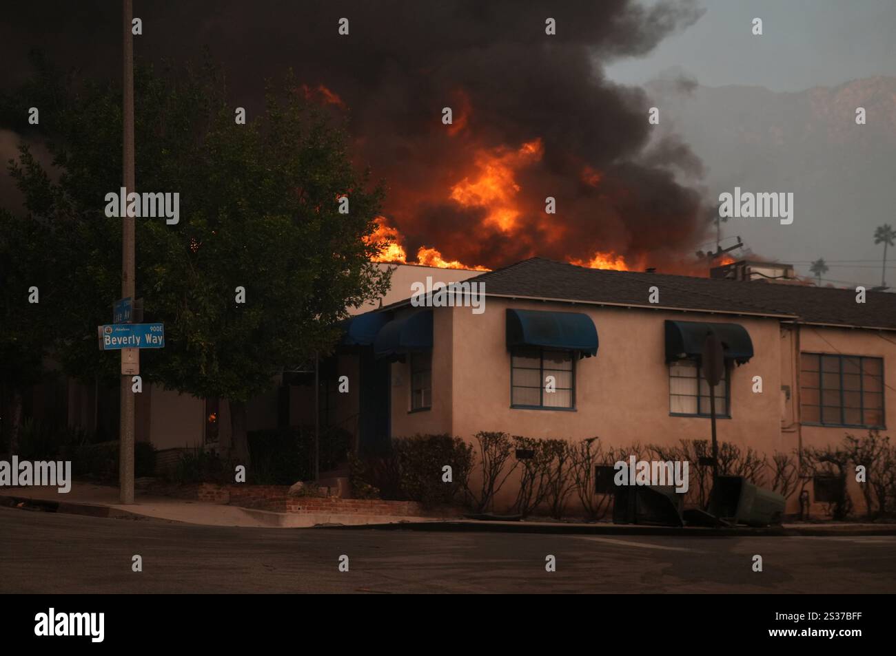 Altadena, United States. 08th Jan, 2025. A residence on Lake Ave. burns ...