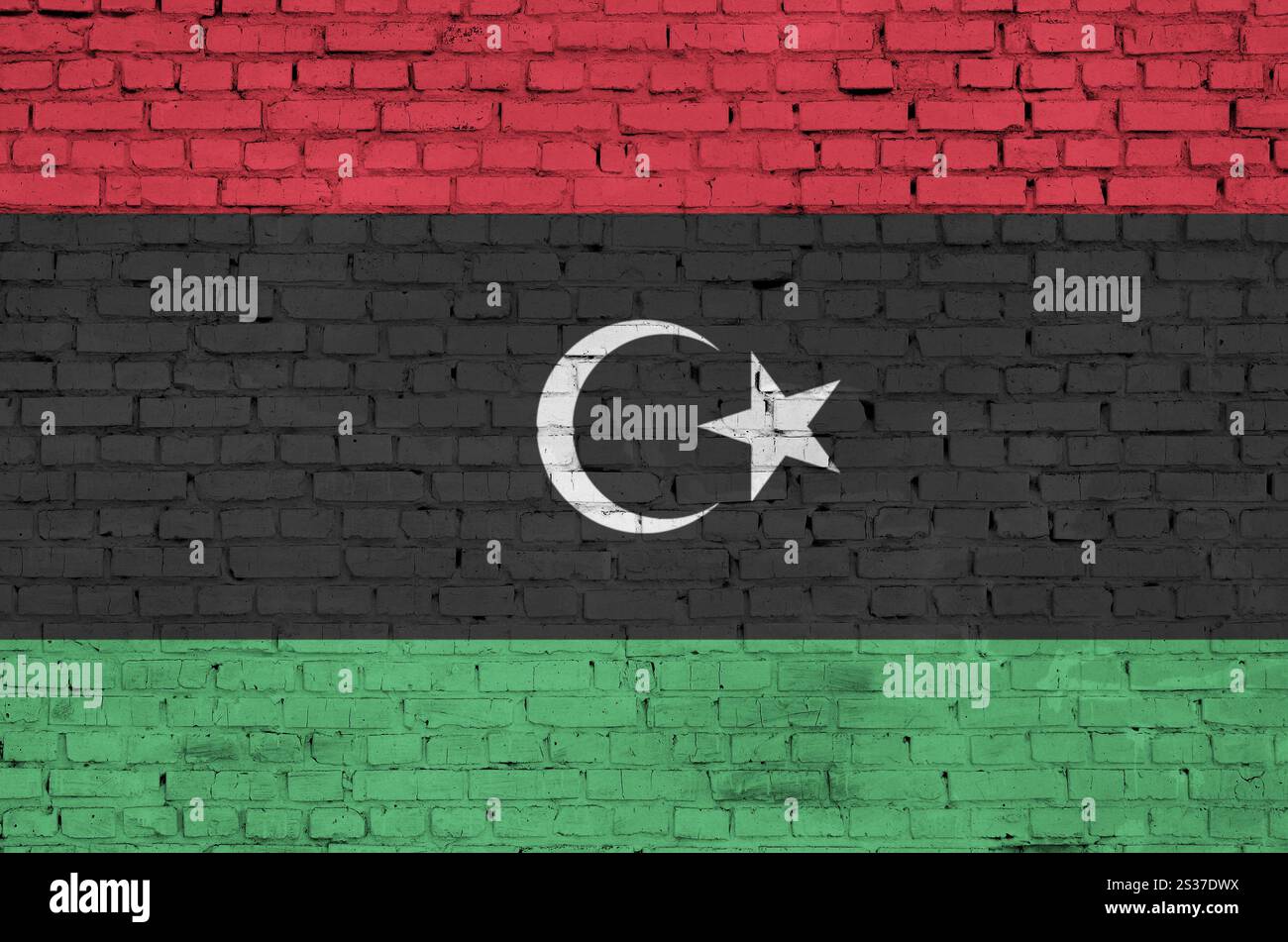 Libya flag is painted onto an old brick wall Stock Photo - Alamy