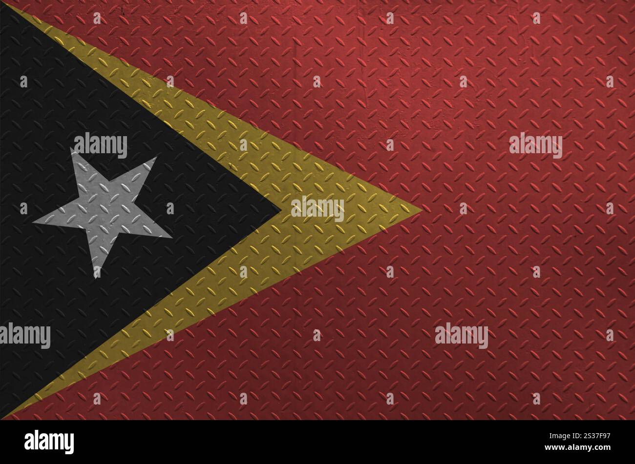 Timor Leste flag depicted in paint colors on old brushed metal plate or ...