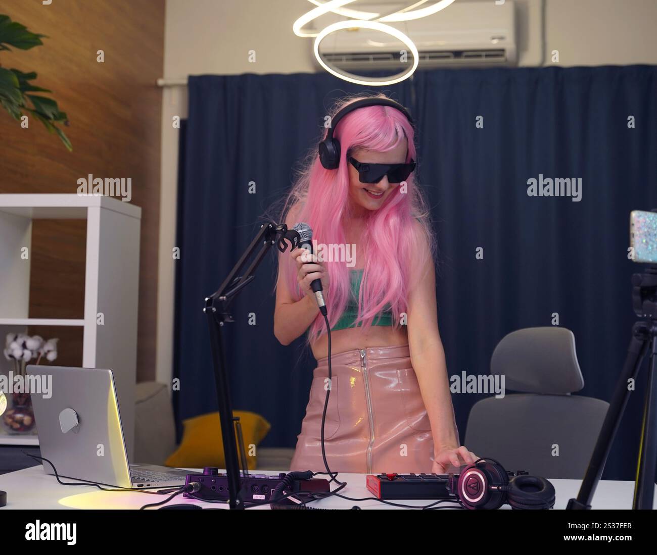 Beautiful young singer and musician broadcast from her home studio ...