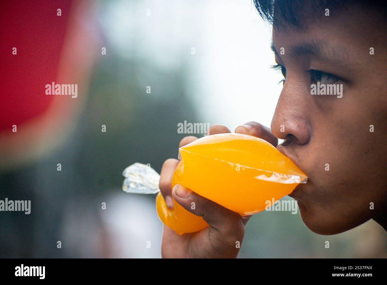 January 9, 2025, Manila, Ncr, Philippines: A Catholic devotee drinks ...