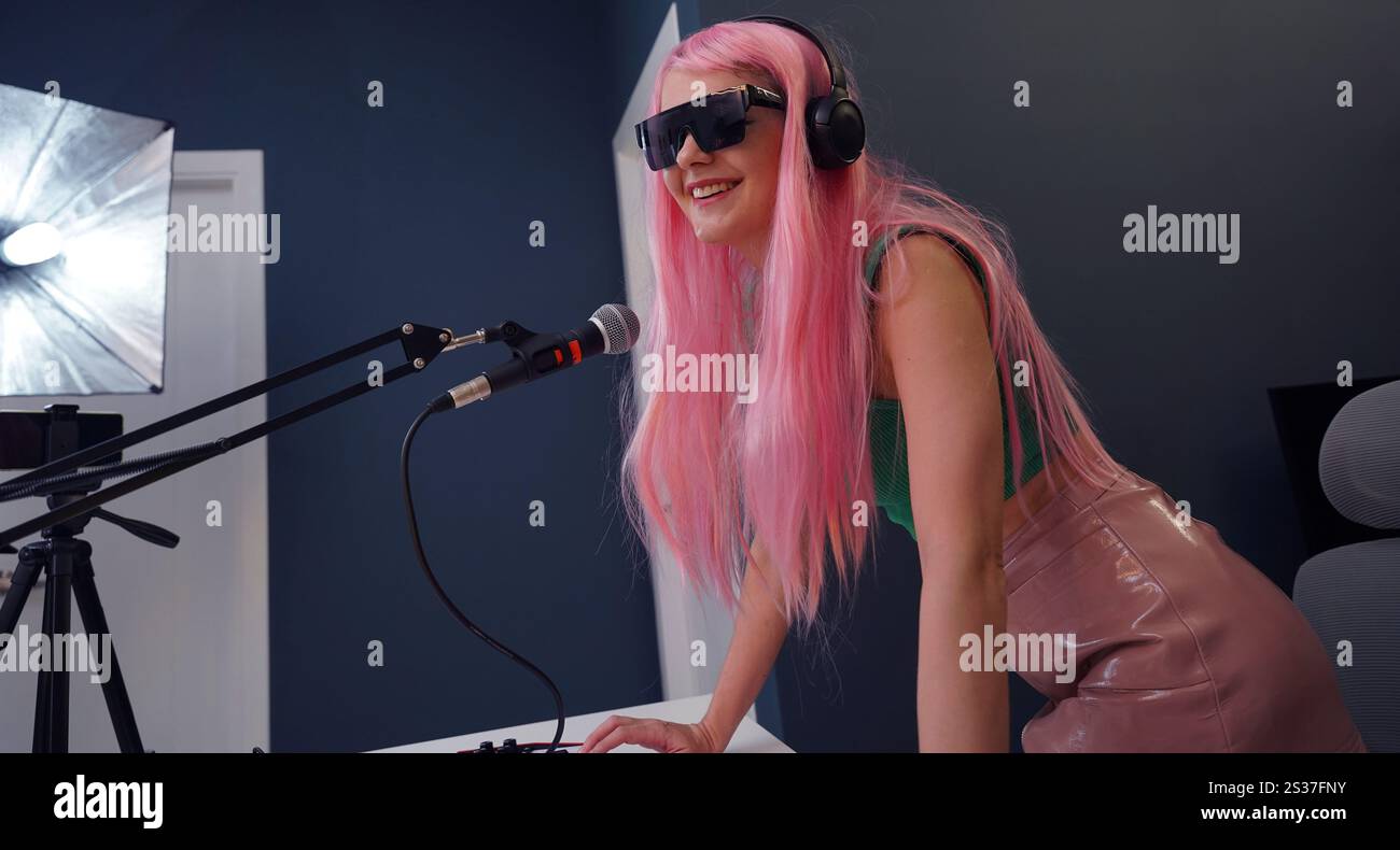 Beautiful young singer and musician broadcast from her home studio ...