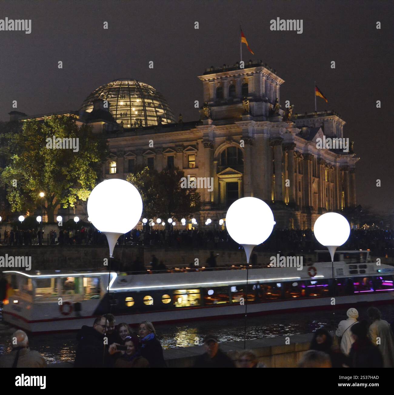 Berlin Reichstag building with light balloons of the former wall Stock ...