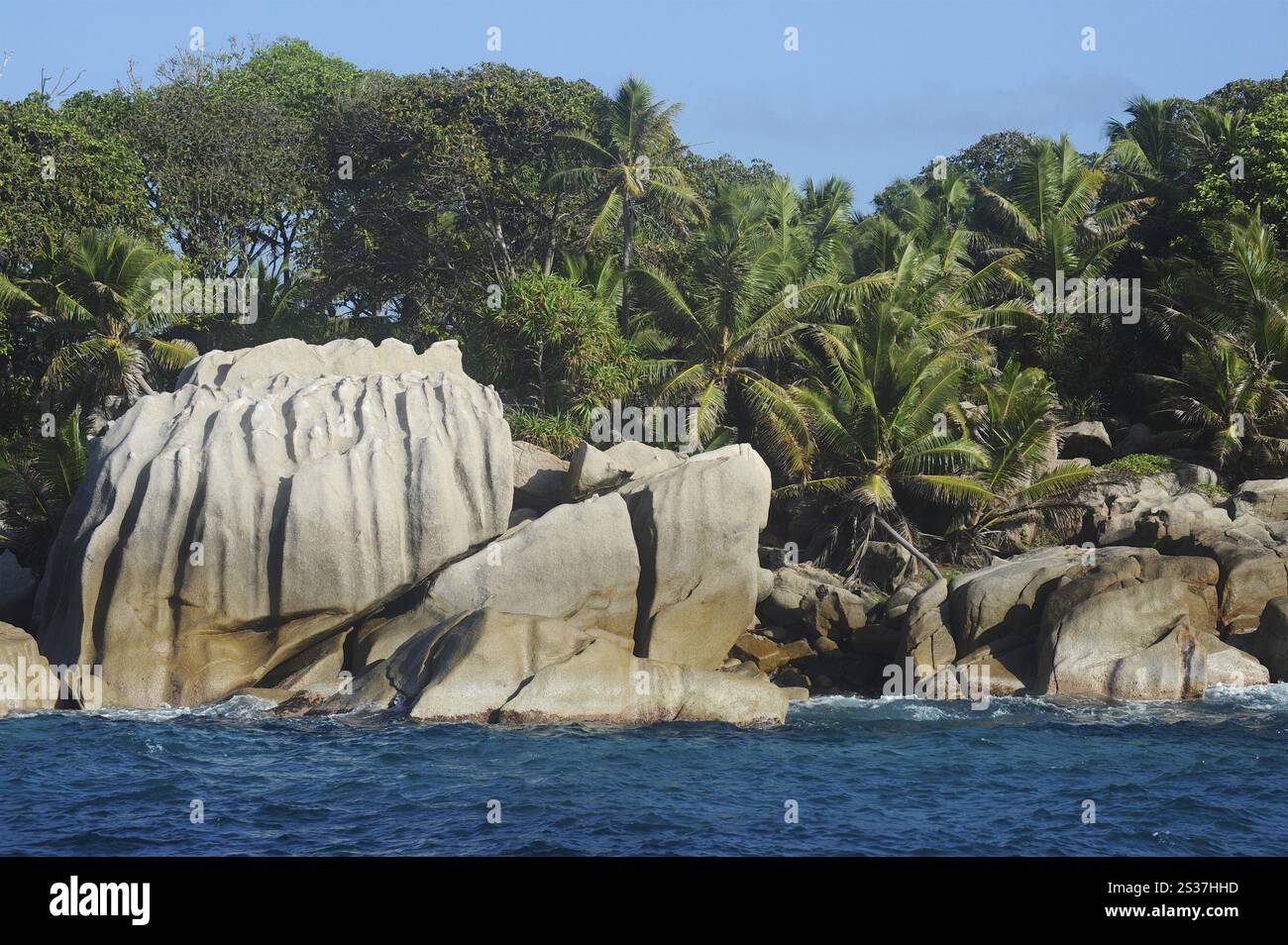 The granite rocks on Coco Island Stock Photo - Alamy