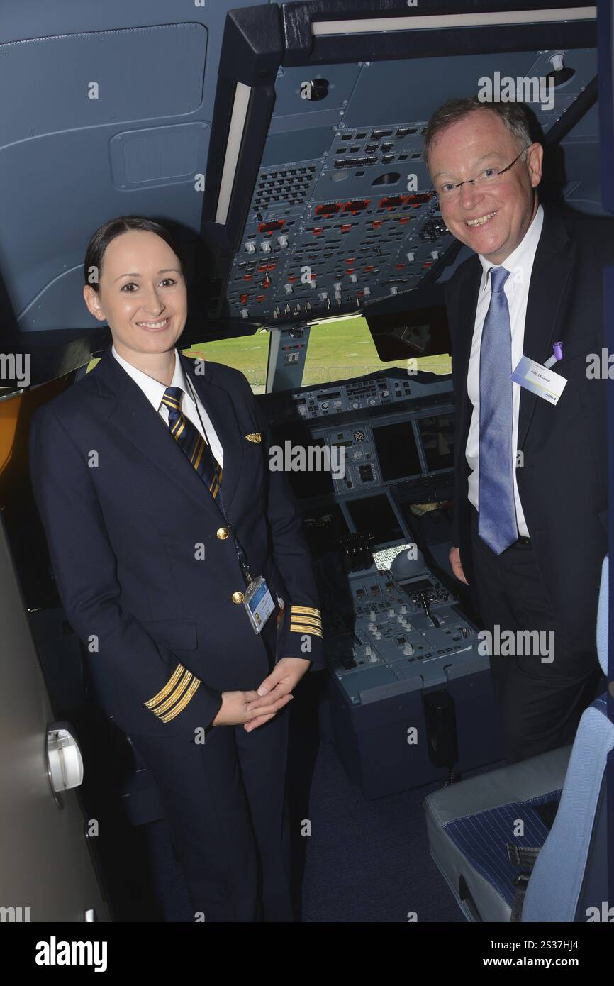 Emirates pilot with Minister President Stephan Weil in the cockpit of ...