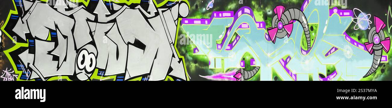 Colorful background of graffiti painting artwork with bright aerosol ...