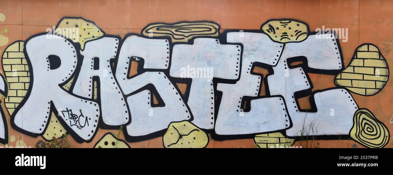 A photograph of a detailed wall artwork. Graffiti drawing is made with ...
