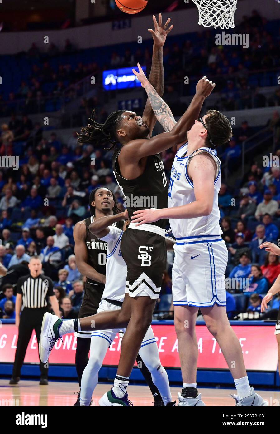ST. LOUIS, MO - JANUARY 08: Saint Louis center Robbie Avila (21) blocks ...