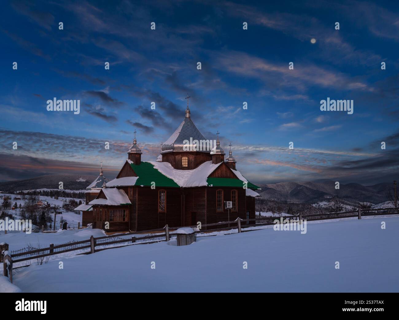 Night countryside hills, groves and farmlands in winter remote alpine ...