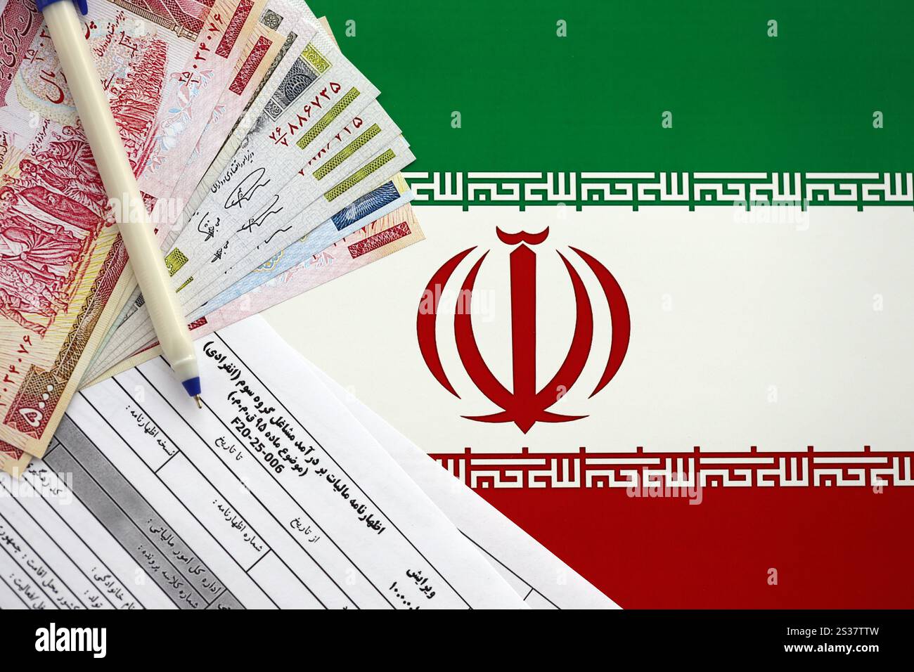 Iranian annual income tax return form F20-25-006 ready to fill on table ...