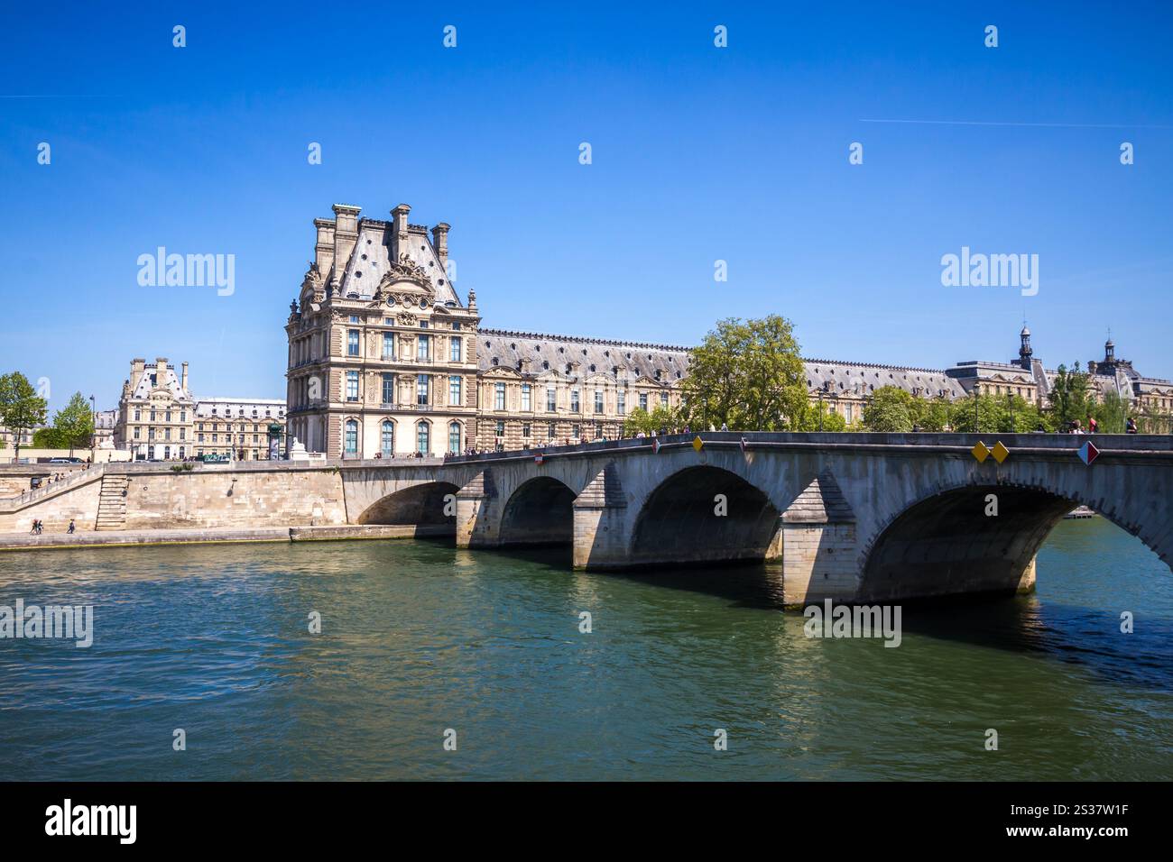 Louvre museum and Royal bridge view from the Seine river banks, Paris ...