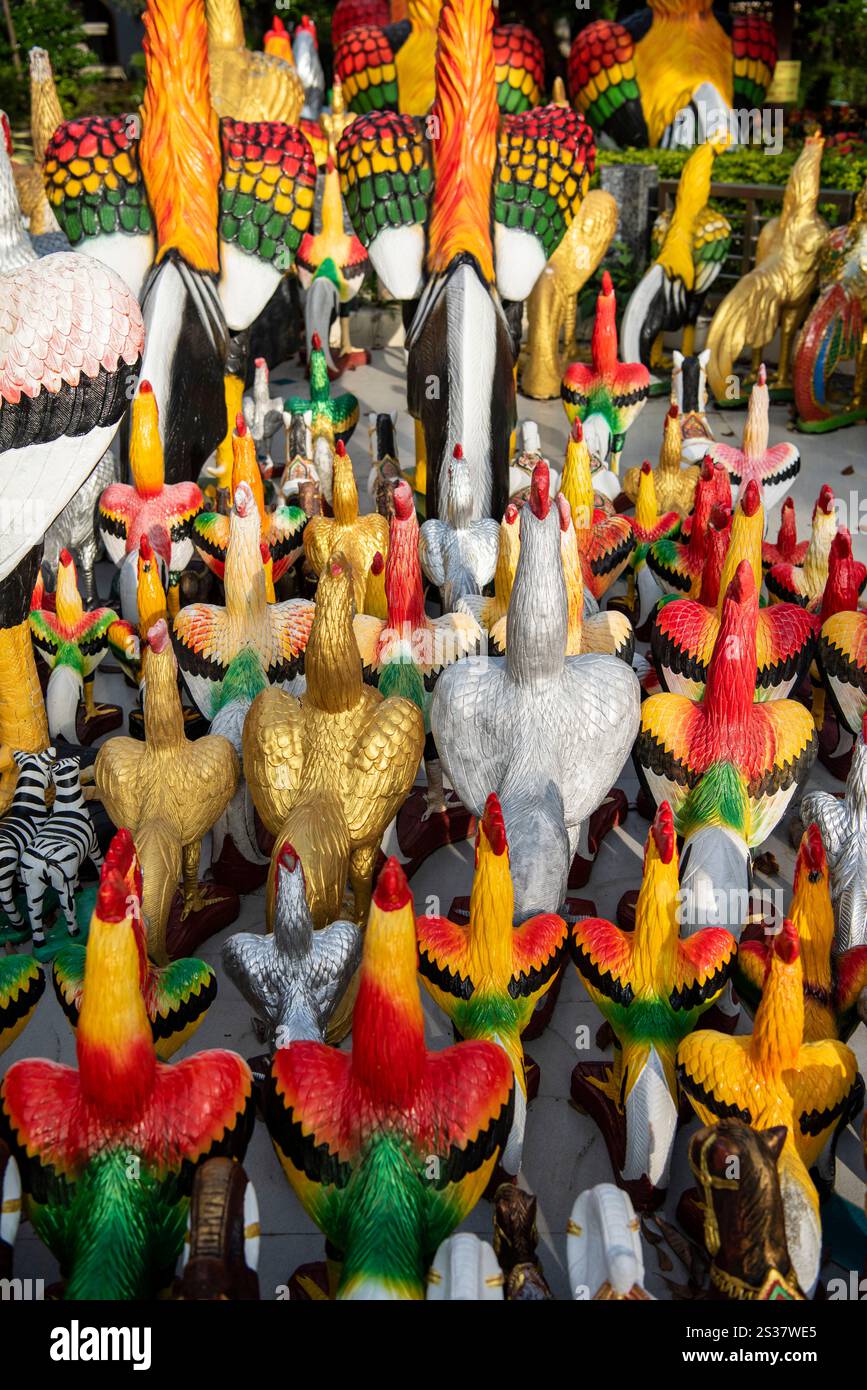 Chicken and Rooster Figures atay in front of the Monument and Statue of ...
