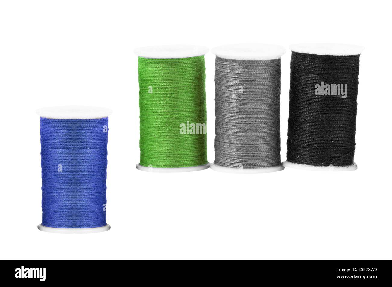 Colourful spools of thread isolated on white background. Colourful ...