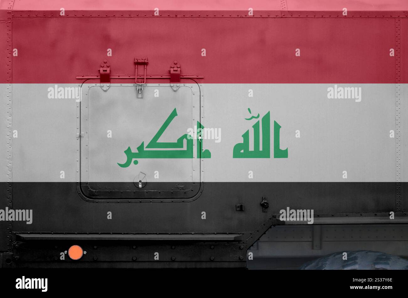 Iraq flag depicted on side part of military armored truck close up ...
