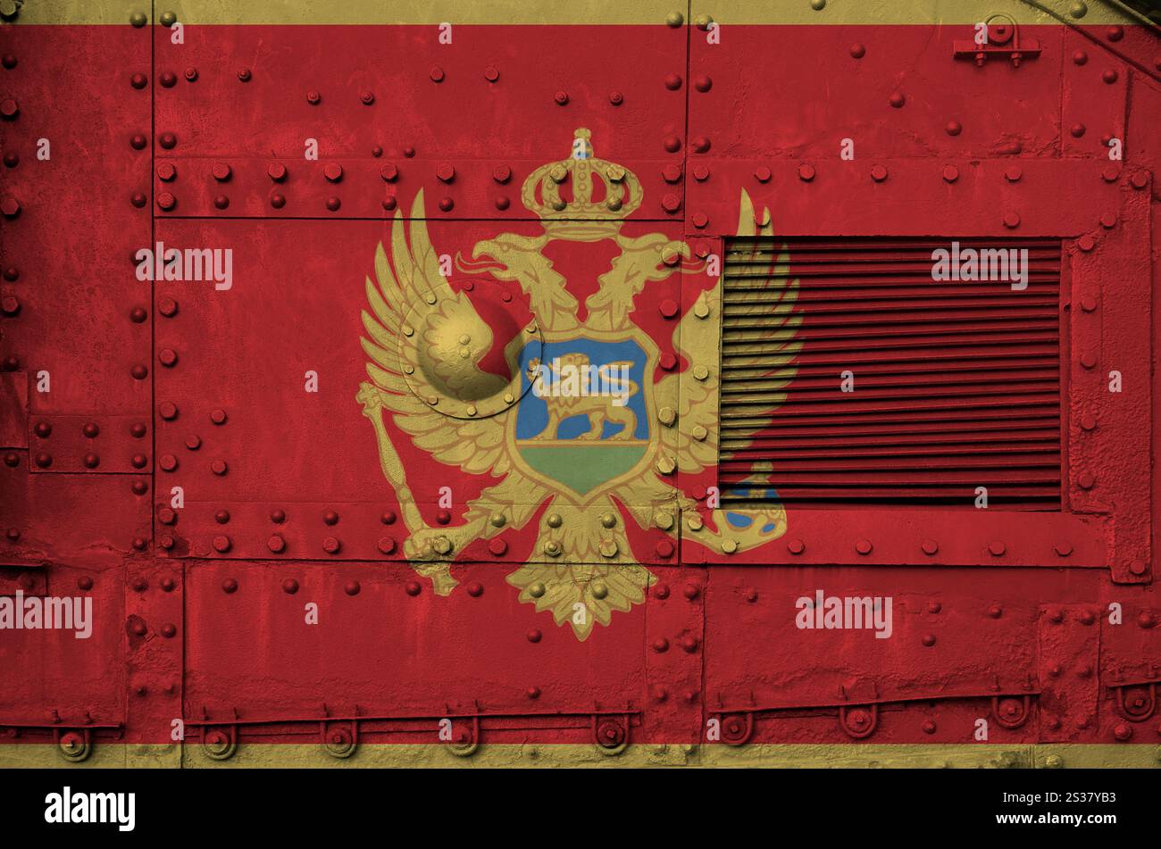 Montenegro flag depicted on side part of military armored tank close up ...
