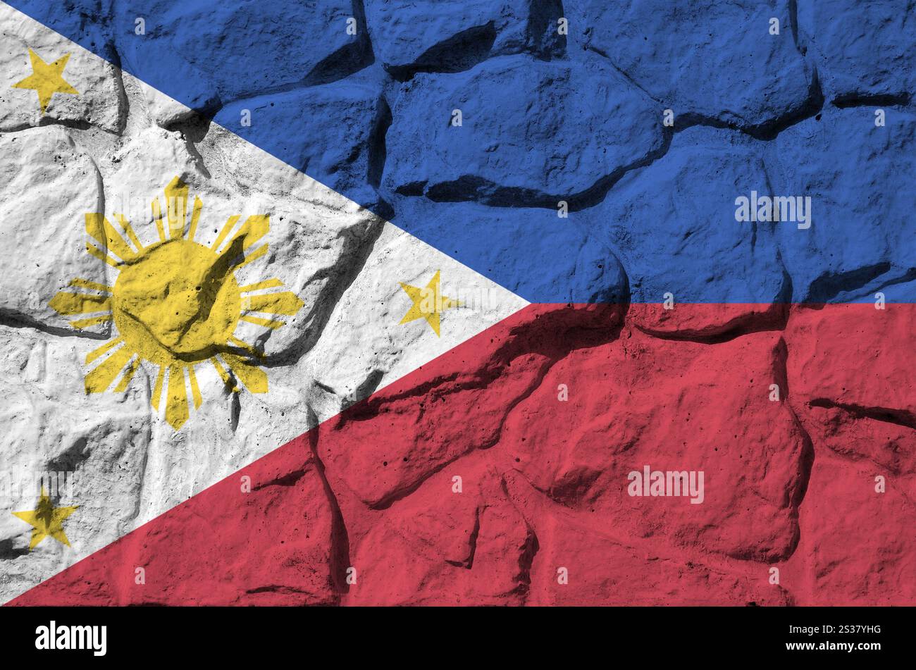 Philippines flag depicted in paint colors on old stone wall close up ...
