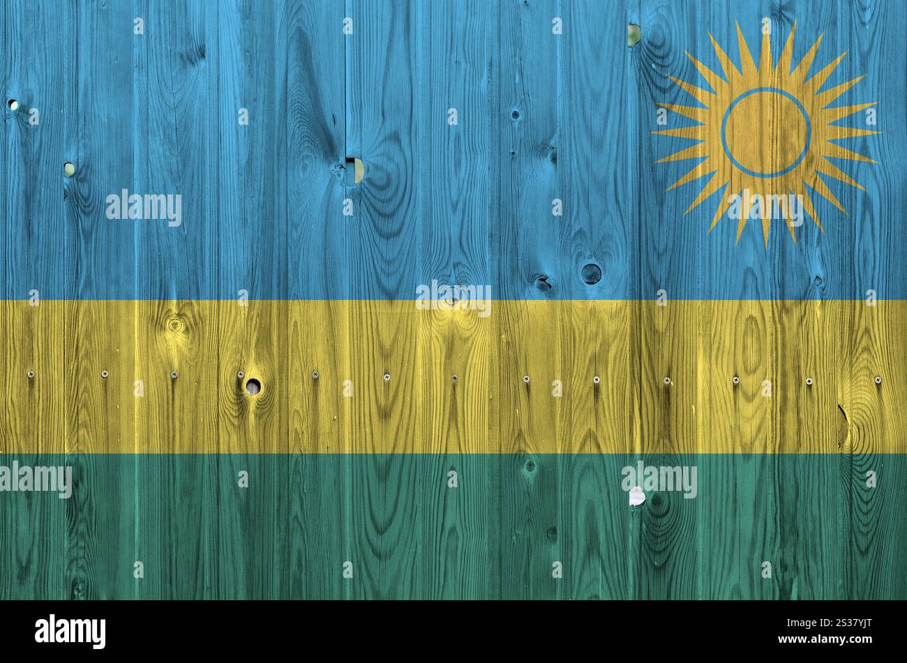 Rwanda flag depicted in bright paint colors on old wooden wall close up ...