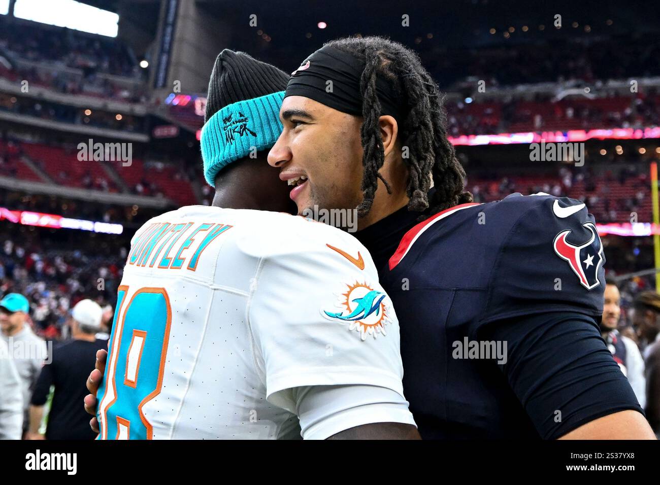 Houston Texans quarterback C.J. Stroud (7) greets Miami Dolphins ...