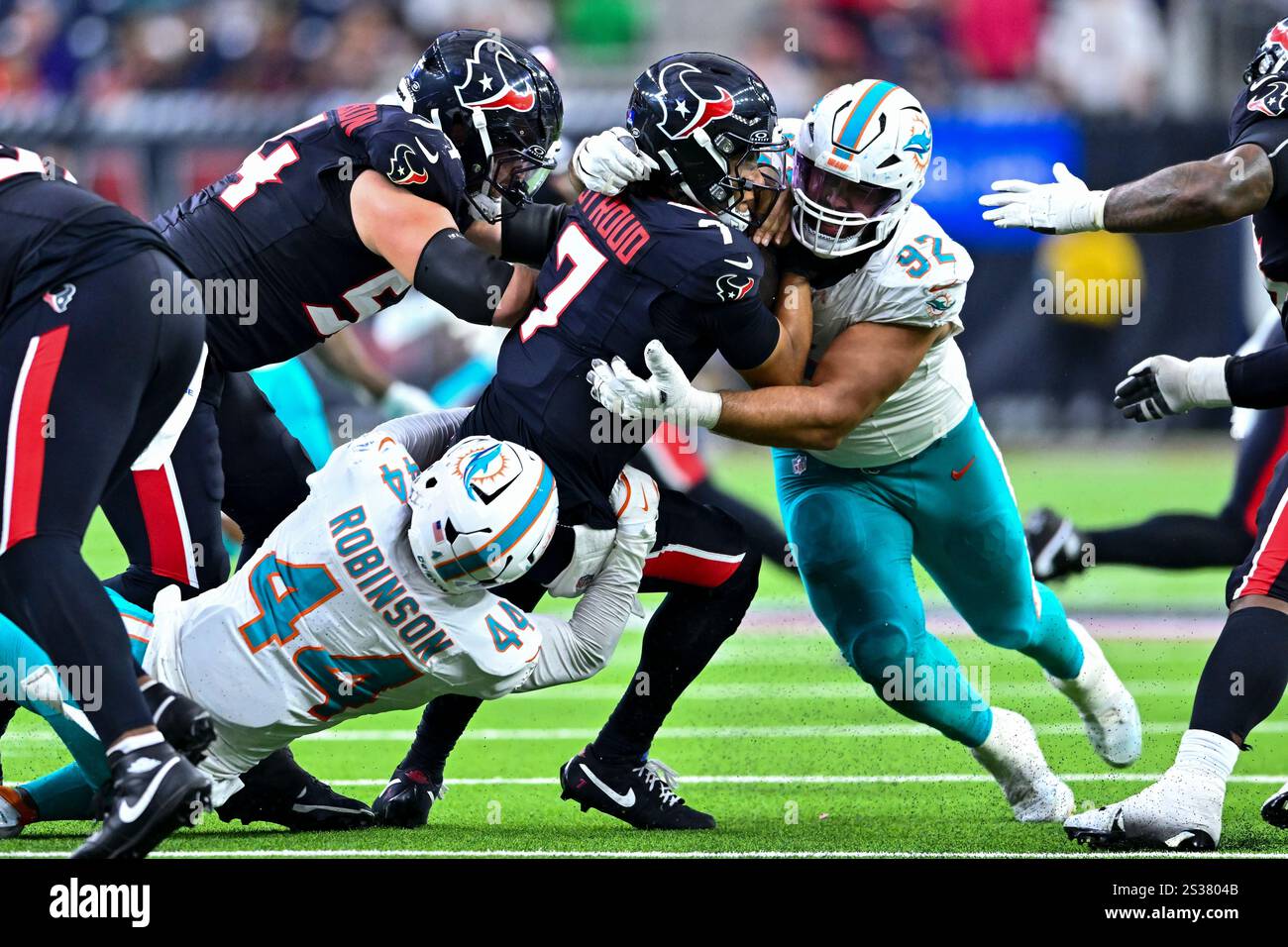 Miami Dolphins defensive tackle Zach Sieler (92) and linebacker Chop ...