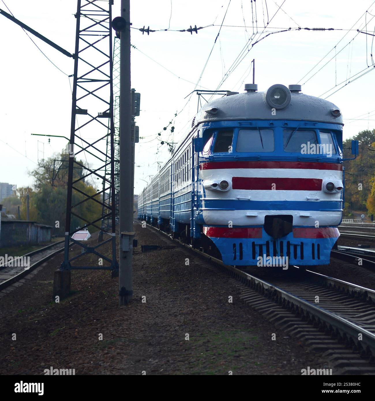 Suburban electric train. Old soviet electric train with outdated design ...