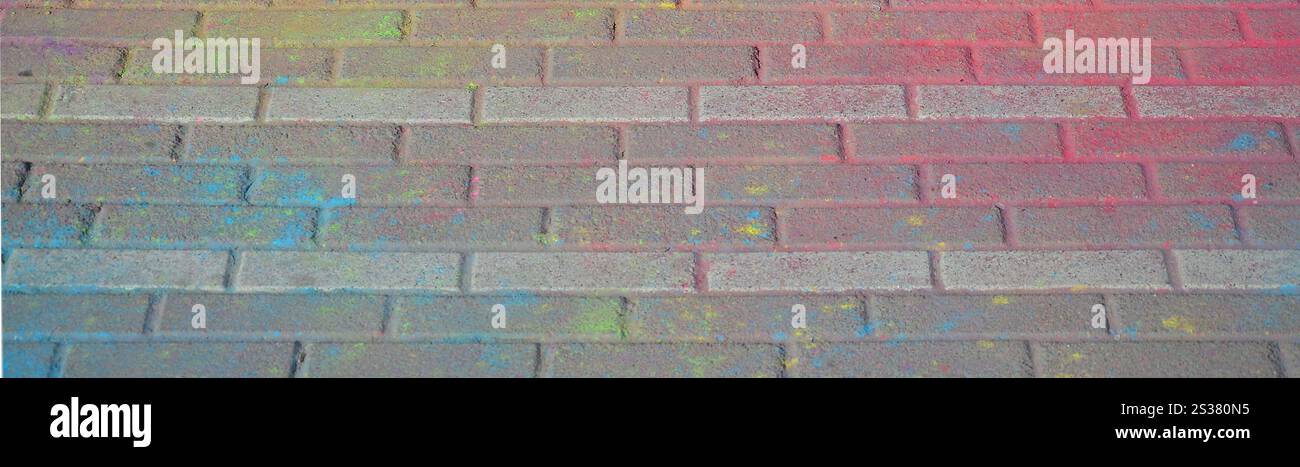 Multi colored earth, paving slabs, powder coated with dry colors at the ...