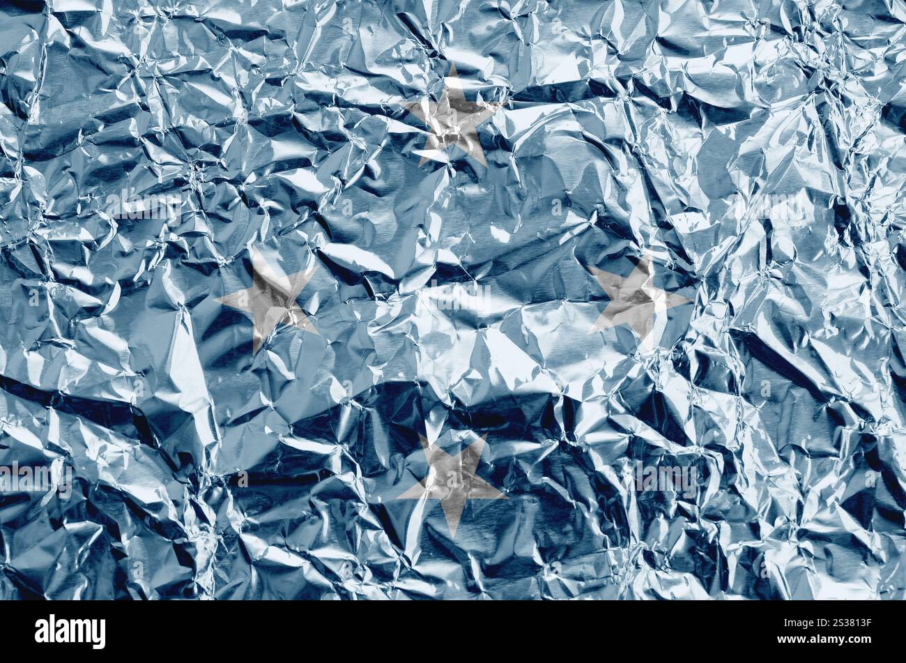 Micronesia flag depicted in paint colors on shiny crumpled aluminium ...