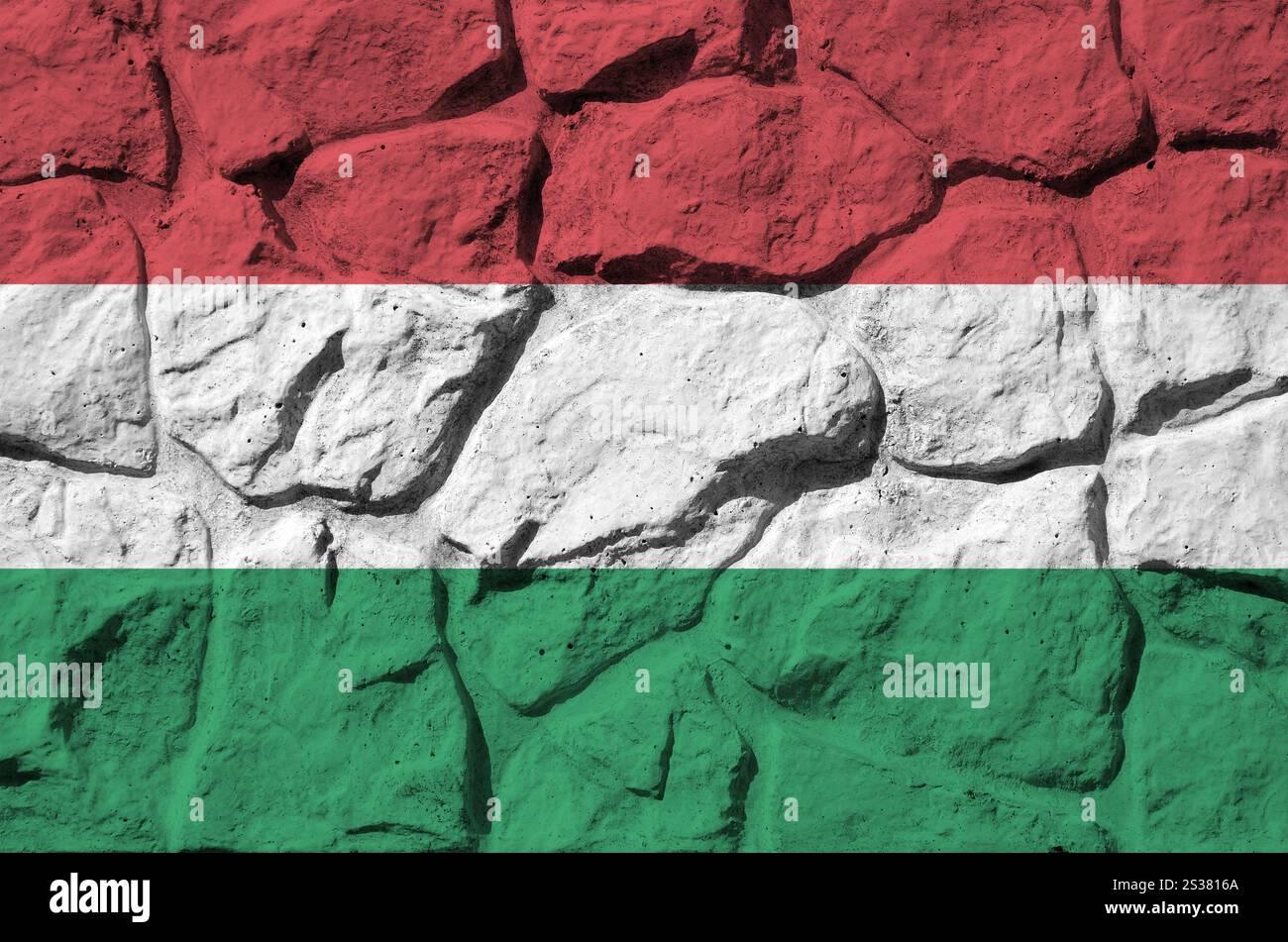 Hungary flag depicted in paint colors on old stone wall close up ...