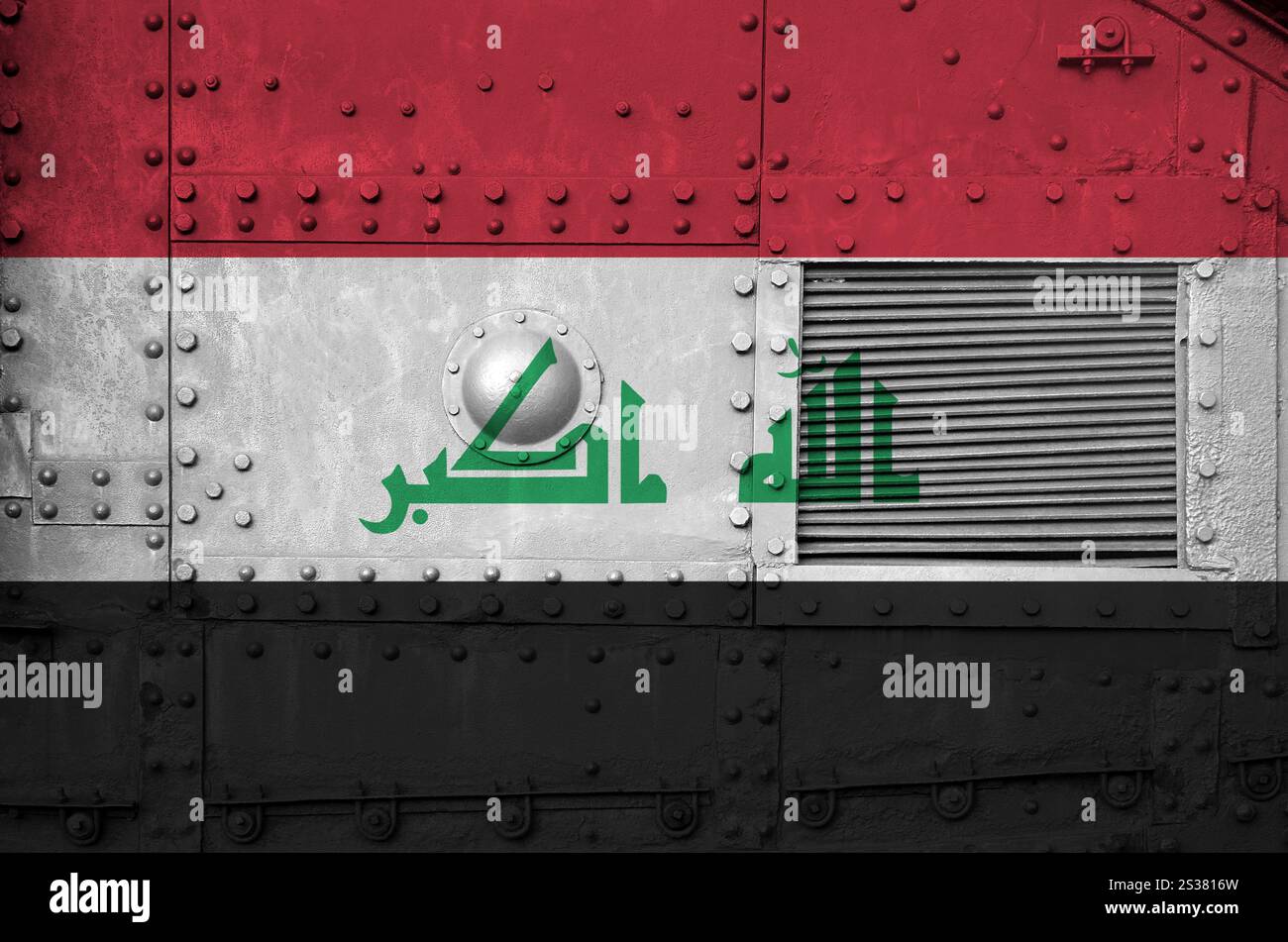 Iraq flag depicted on side part of military armored tank close up. Army ...