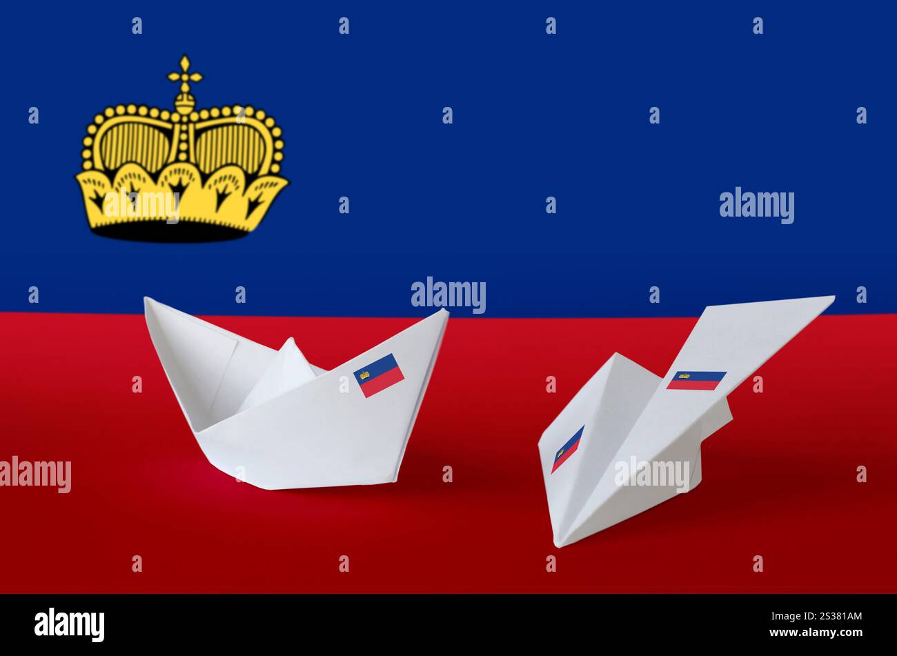 Liechtenstein flag depicted on paper origami airplane and boat ...