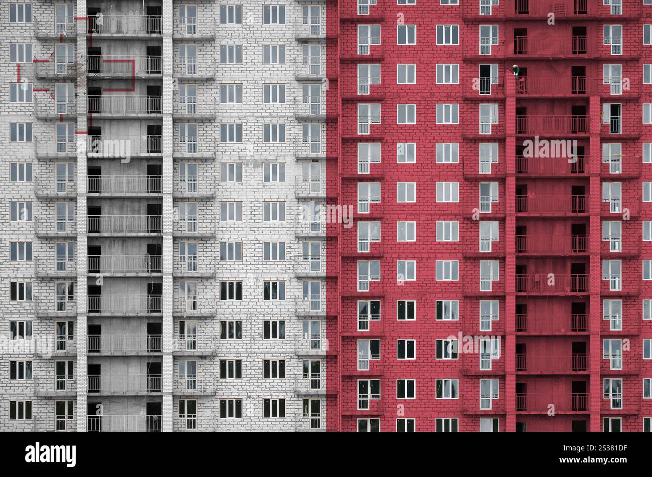 Malta flag depicted in paint colors on multi-storey residental building ...